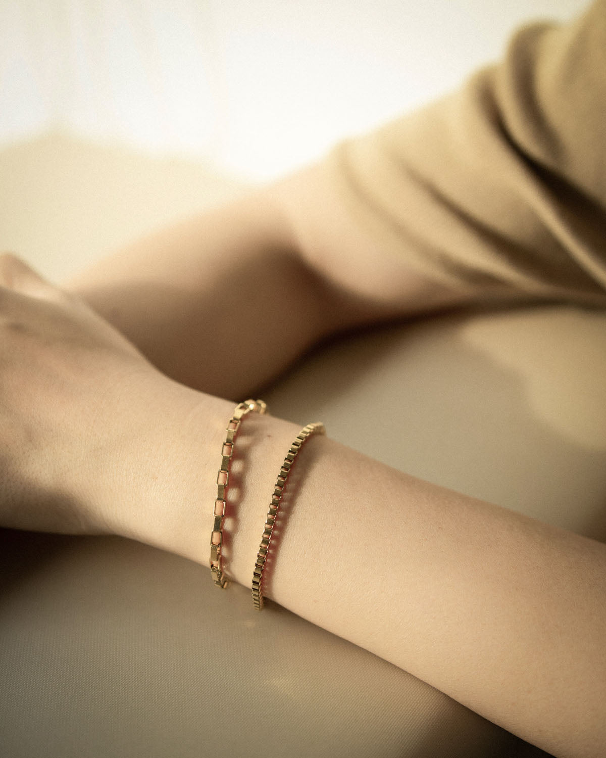 multiple gold bracelets